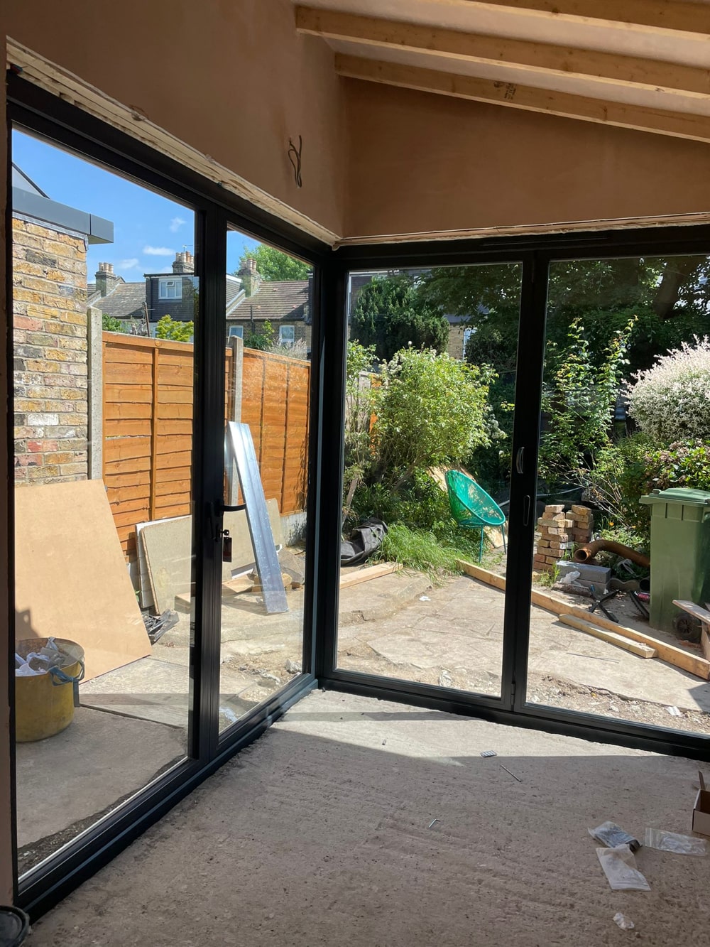 Corner bifold door fitting in East London